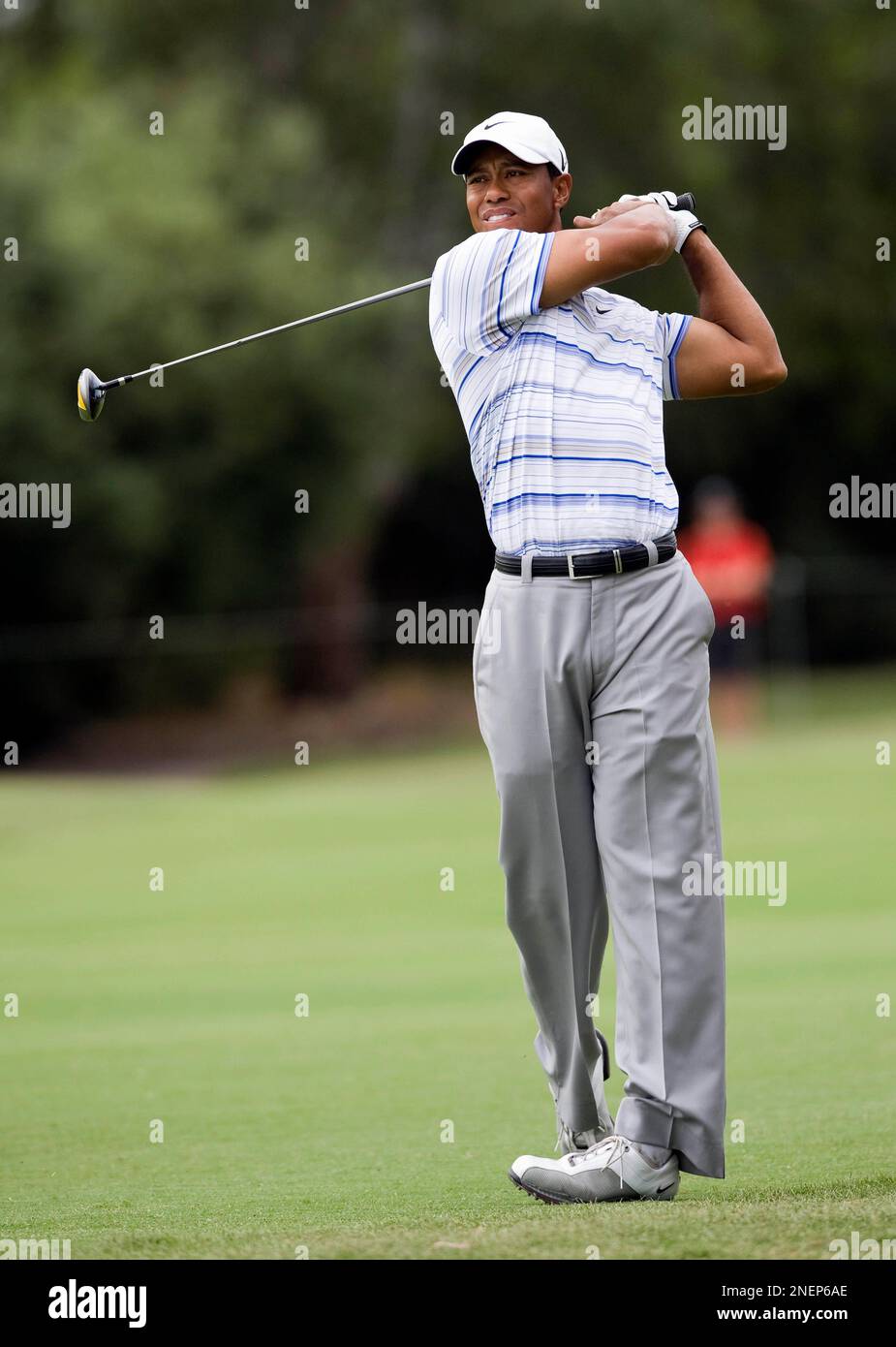 Tiger Woods from the United States hits an approach shot during the ...