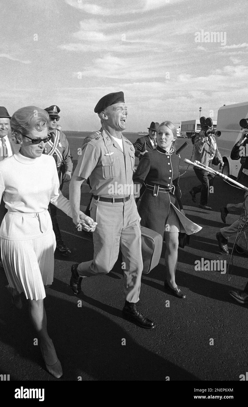 Co. Robert B. Rheault, 43, of Vineyard Haven, Mass., runs along ramp at ...