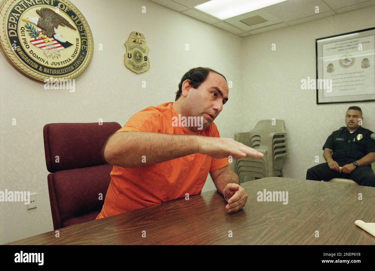 Doctor Ali Yasin Mohammed-Karim, 55, a radiologist from Iraq, gestures ...