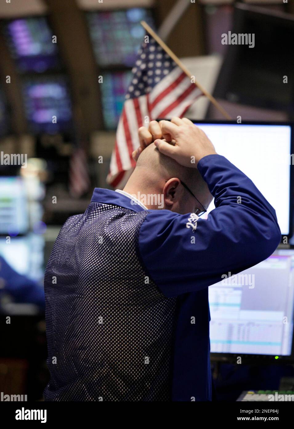 Specialist John Urbanowicz works on the floor of the New York Stock ...