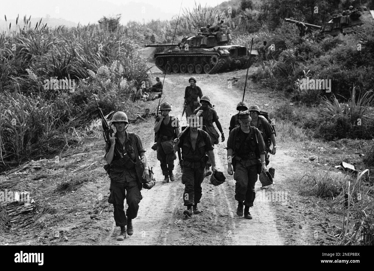 A squad of U.S. Marines moves up Route 9 toward Khe Sanh as part of ...