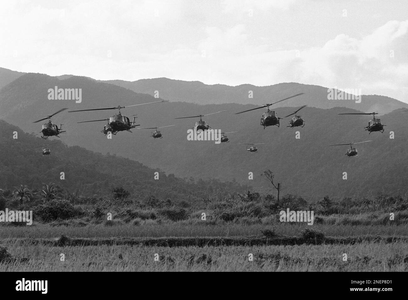 Cavalrymen leave their helicopters and scramble up the hillside to ...