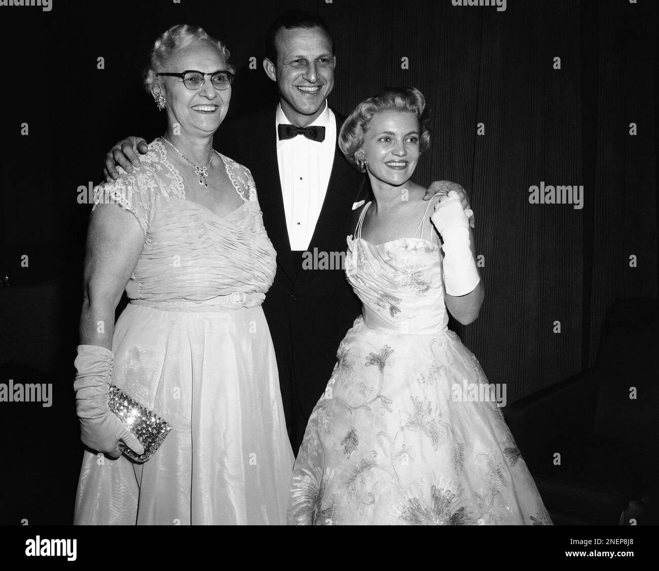 Stan Musial, St. Louis Cardinal baseball star, is flanked by his mother ...