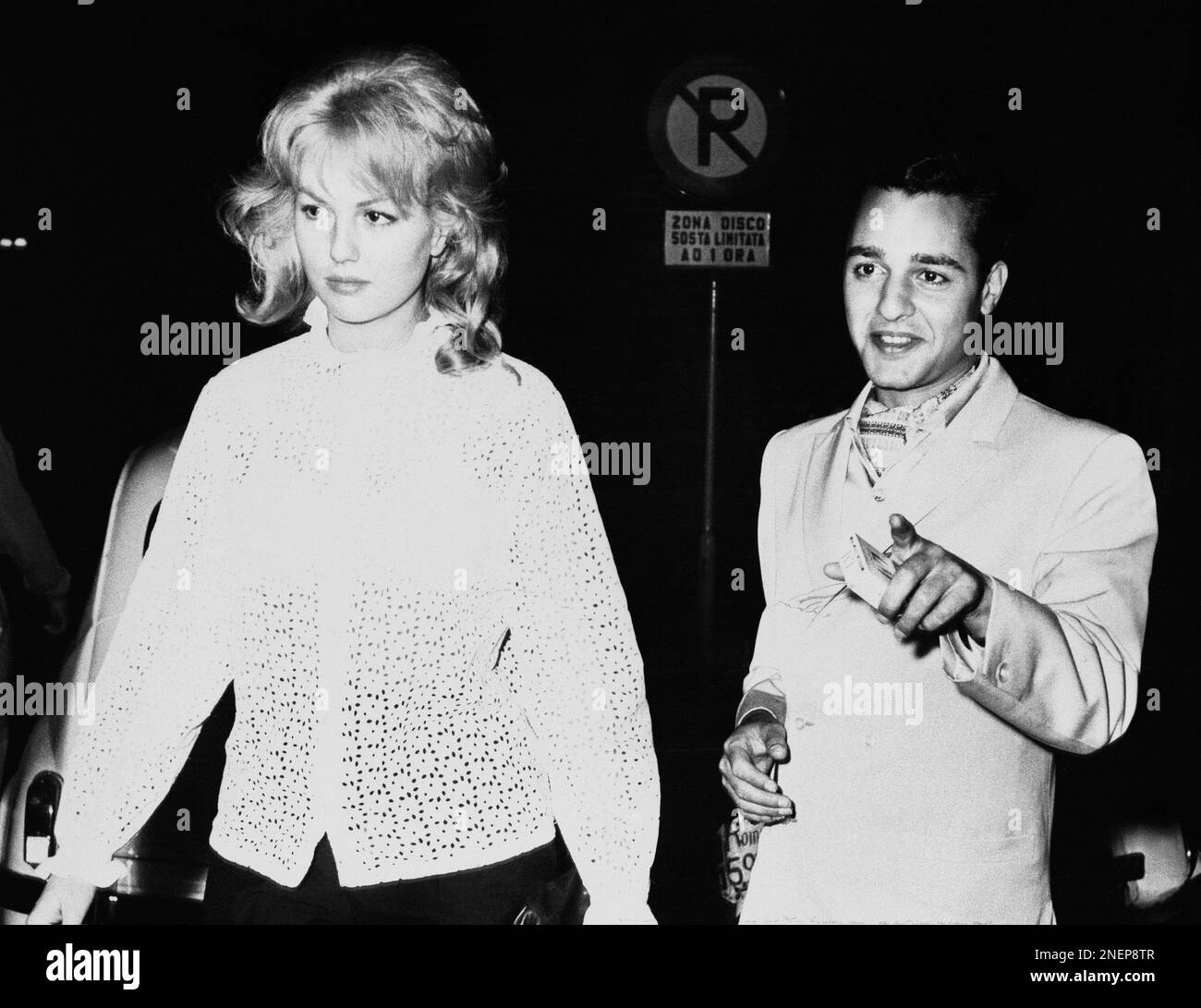 Hollywood actor Sal Mineo, who is in Rome on vacation, strolls with ...