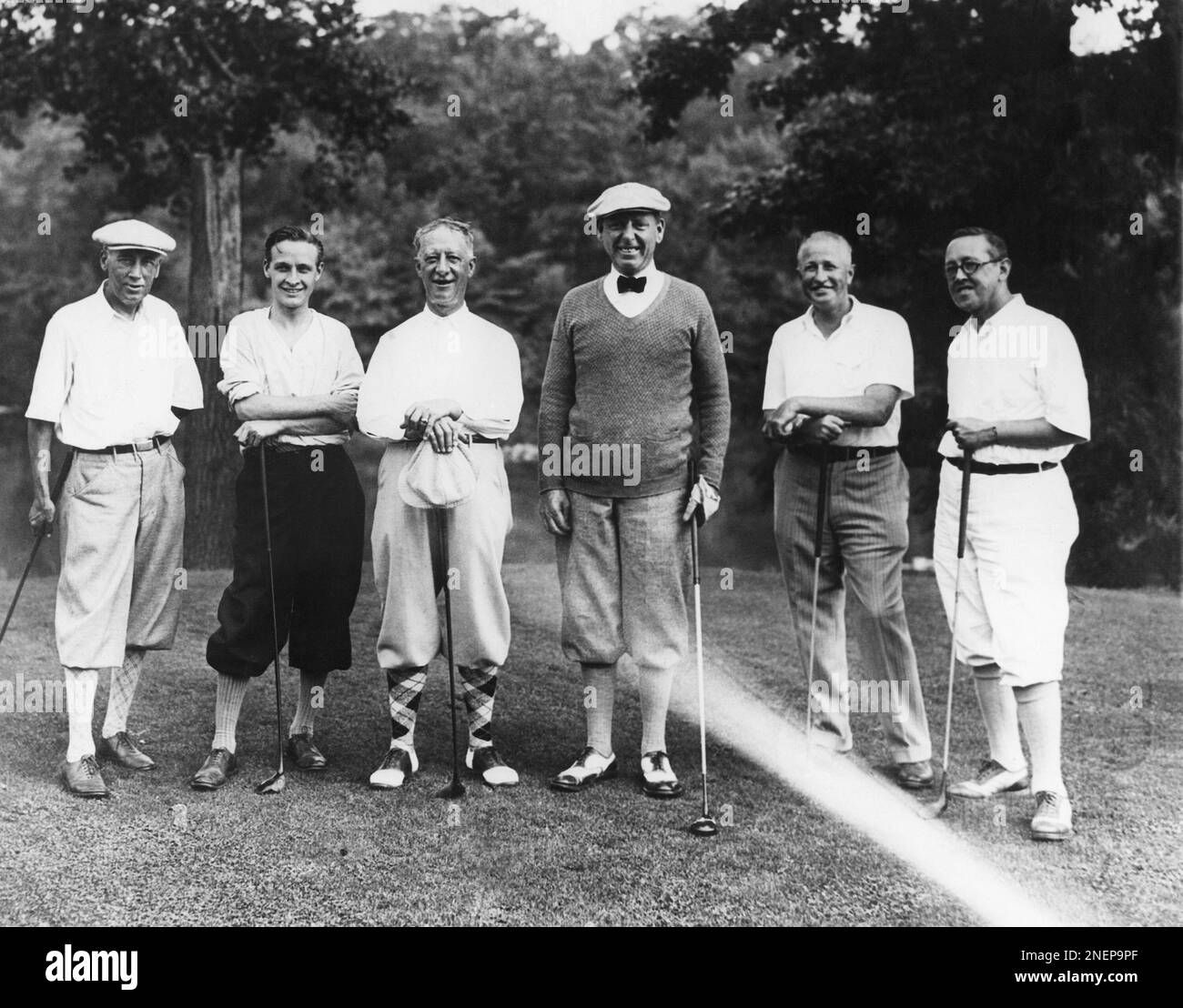 Golf was the main interest of Al Smith as he posed with a group on ...