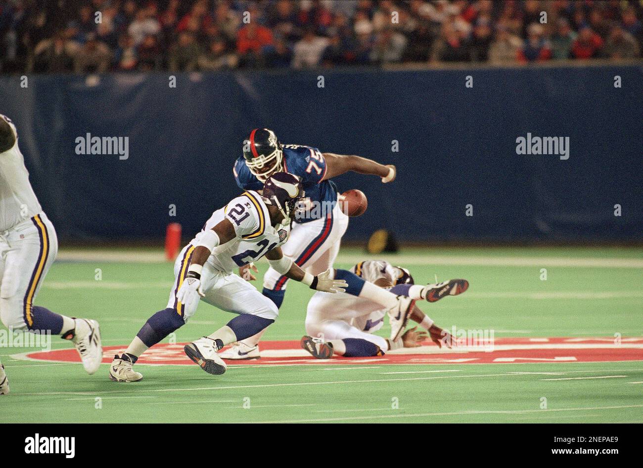 Minnesota Vikings running back Terry Allen (21) is set to recover a ...