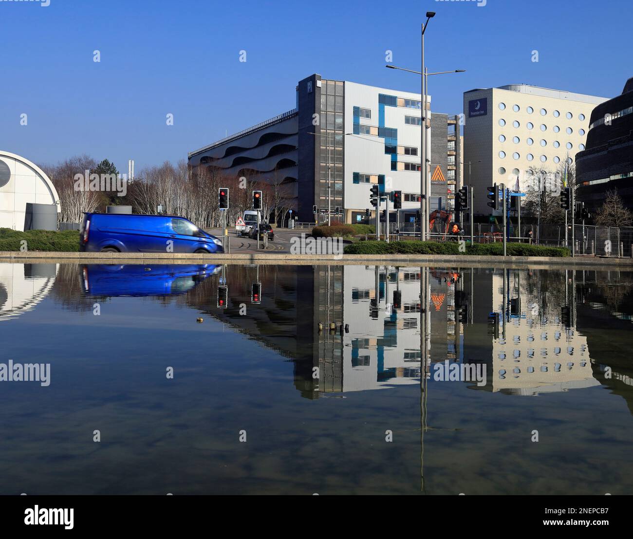 Abstract reflections in a water feature, Red Dragon Centre, Cardiff Bay ...