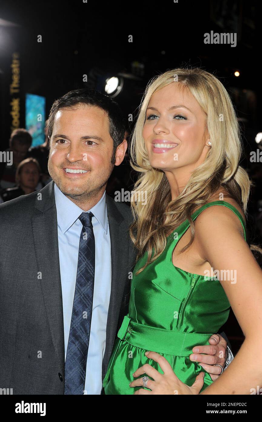 Walt Becker, at left, and his wife Lindsay Becker arrive to the ...