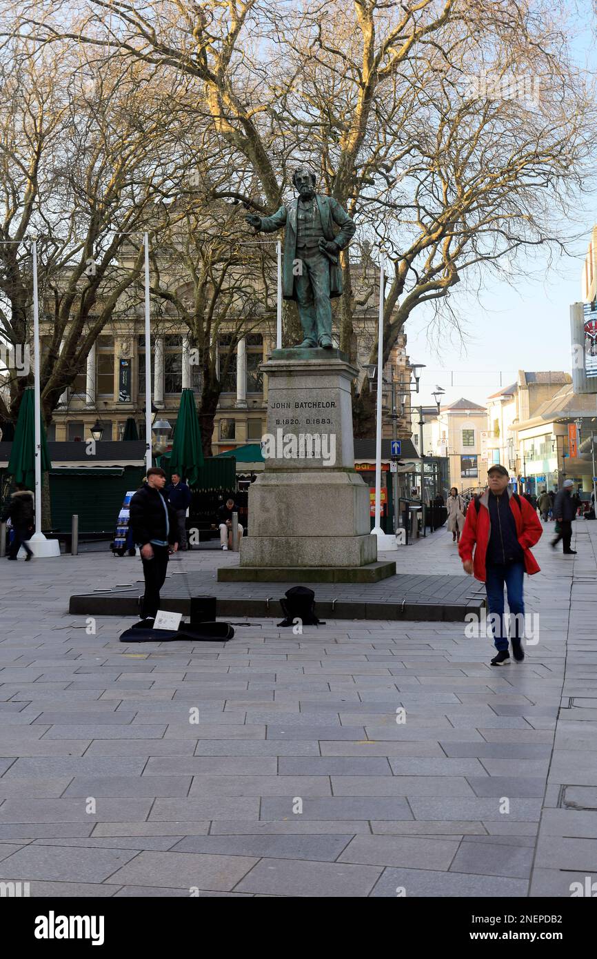 The Hayes, Cardiff. Statue of John Bachelor, busker and passer by ...
