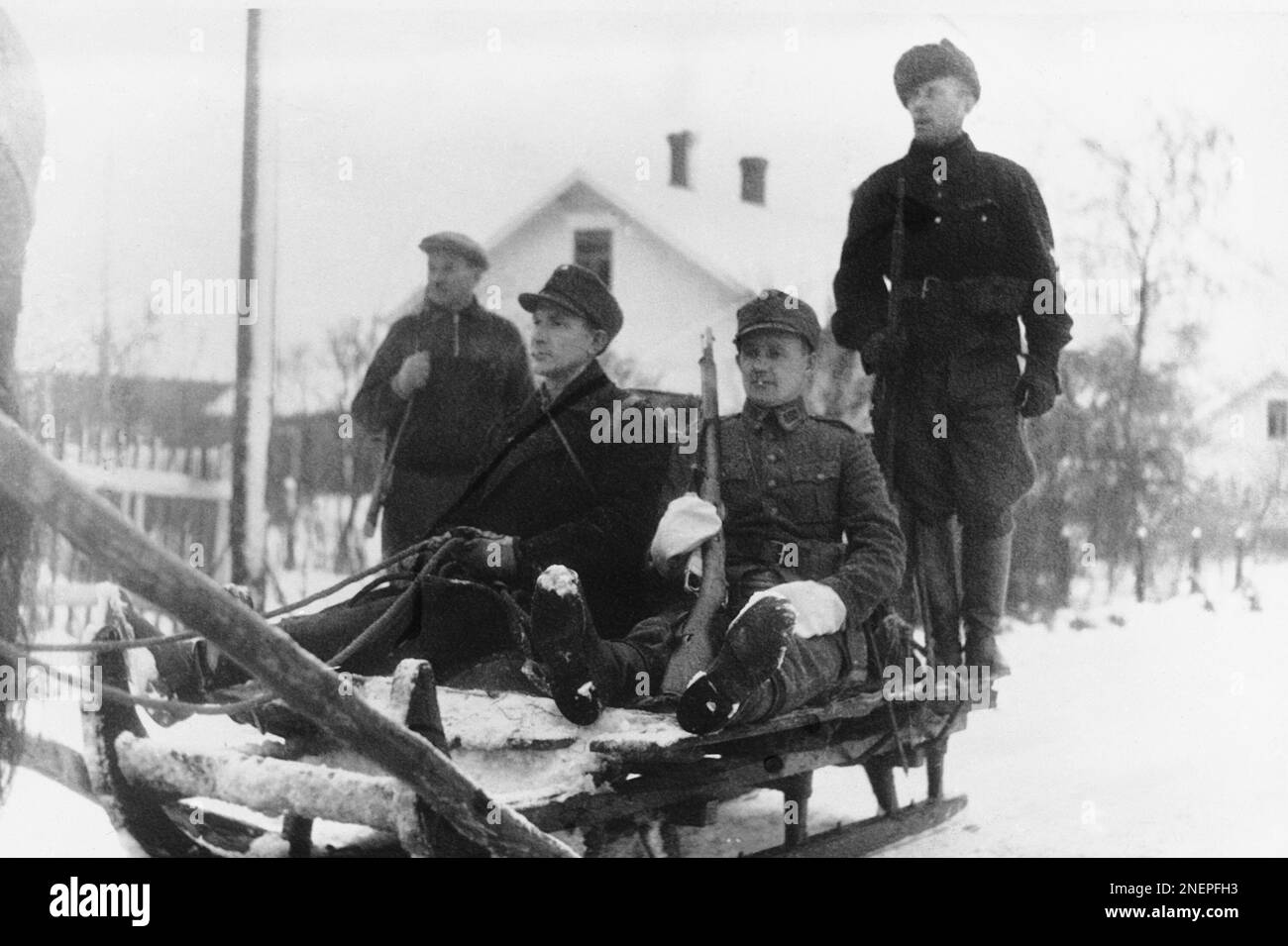 Finnish soldiers use a sleigh on the snow-covered roads near the ...