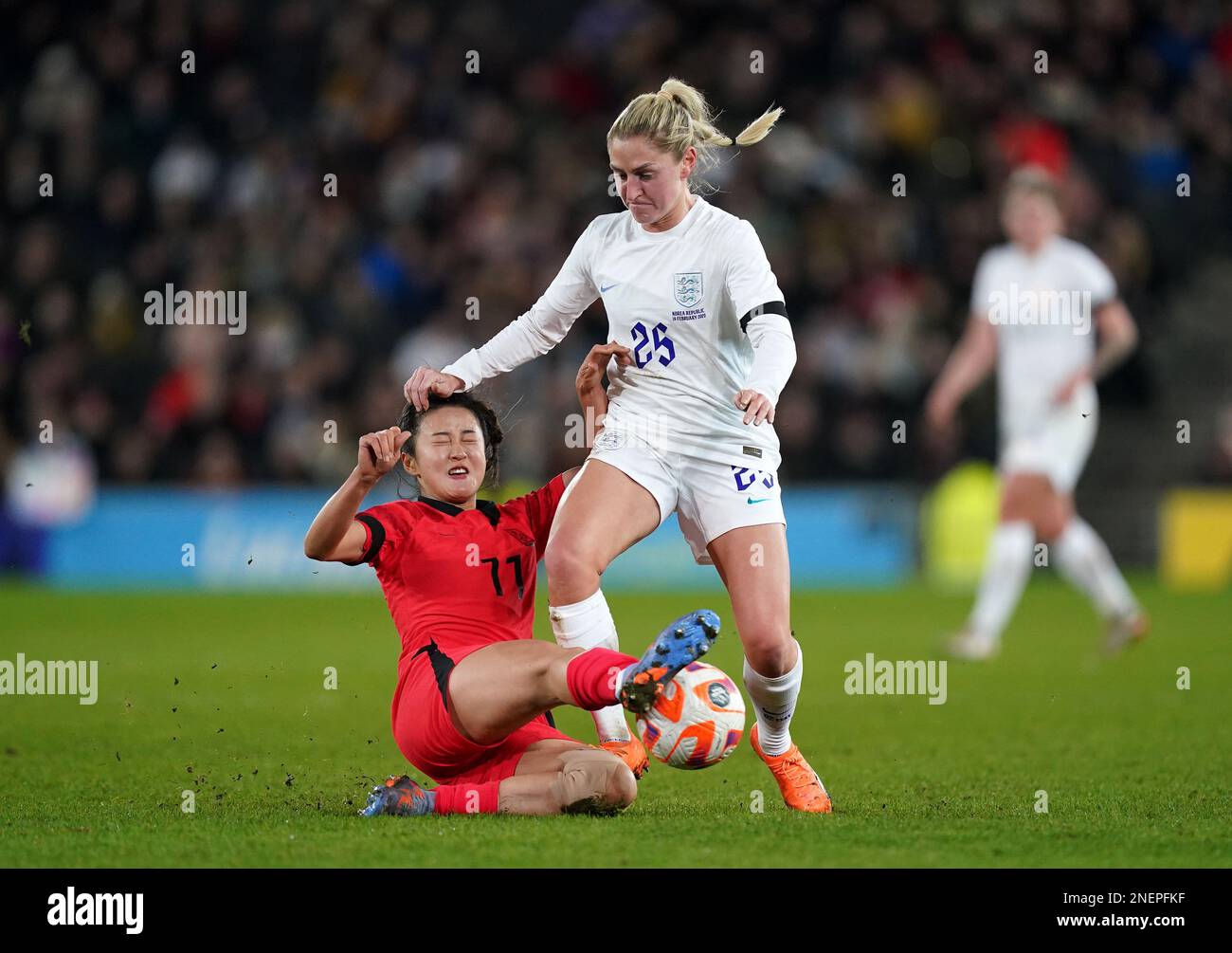 Korea Republic's Choe Yu-Ri (left) and England's Laura Coombs battle ...