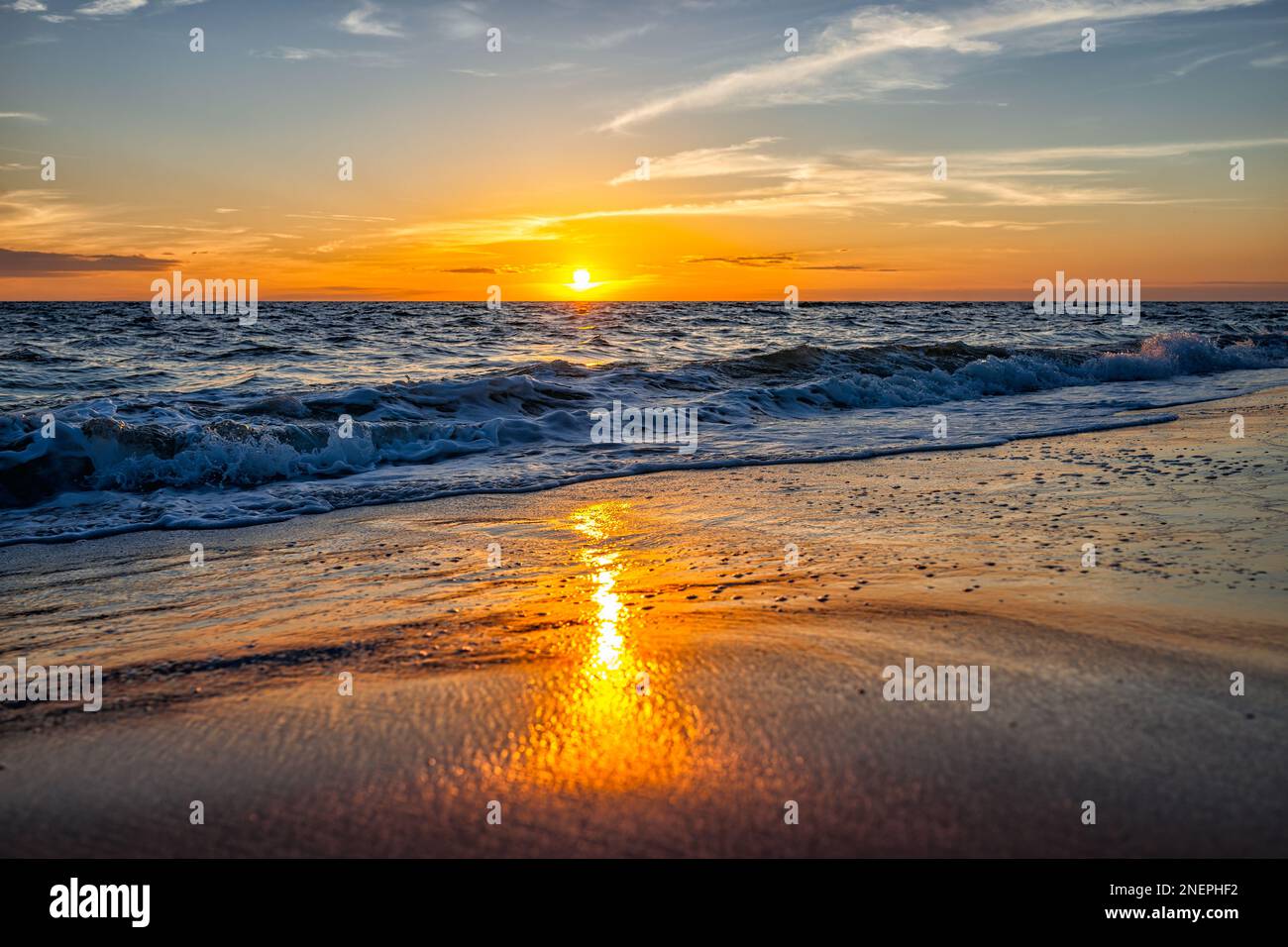 Colorful vibrant orange sunset seascape in Gulf of Mexico in Seaside ...