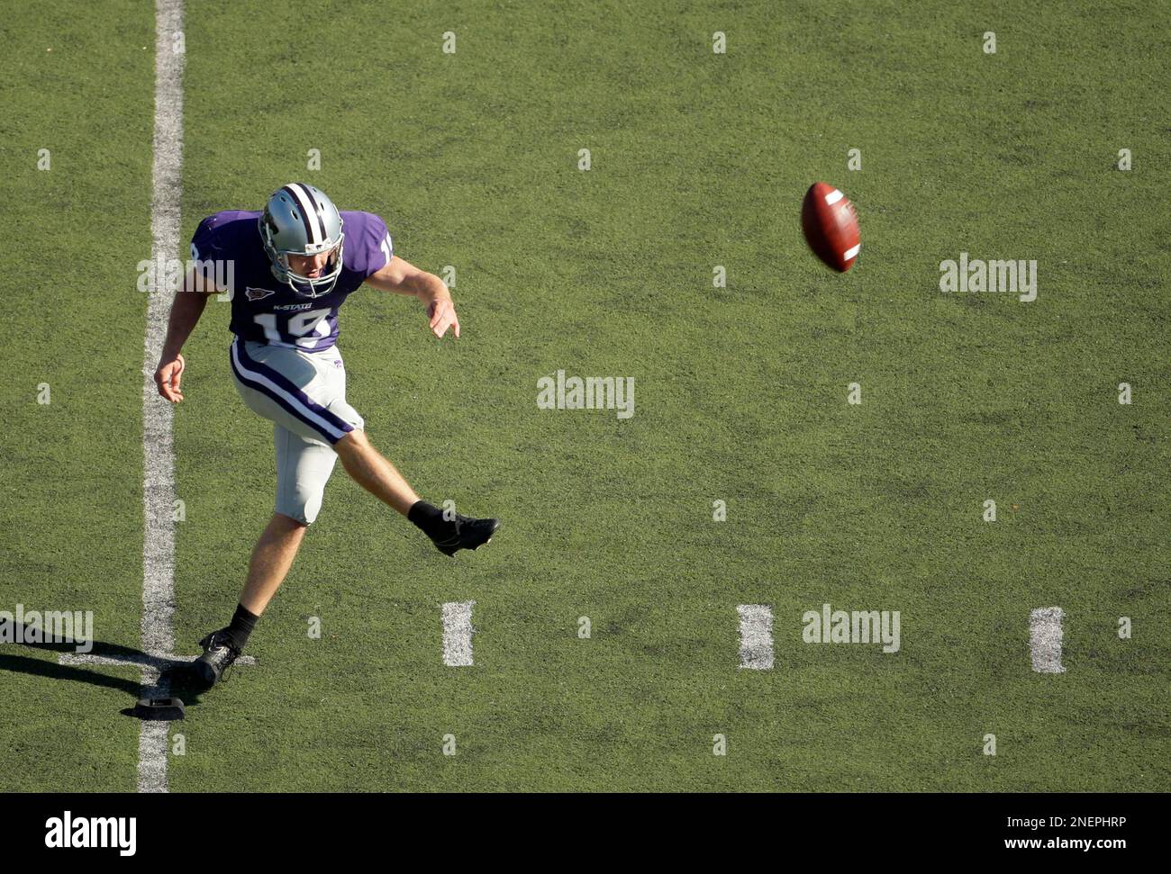 Kansas State kicker Josh Cherry kicks off during the second quarter of ...