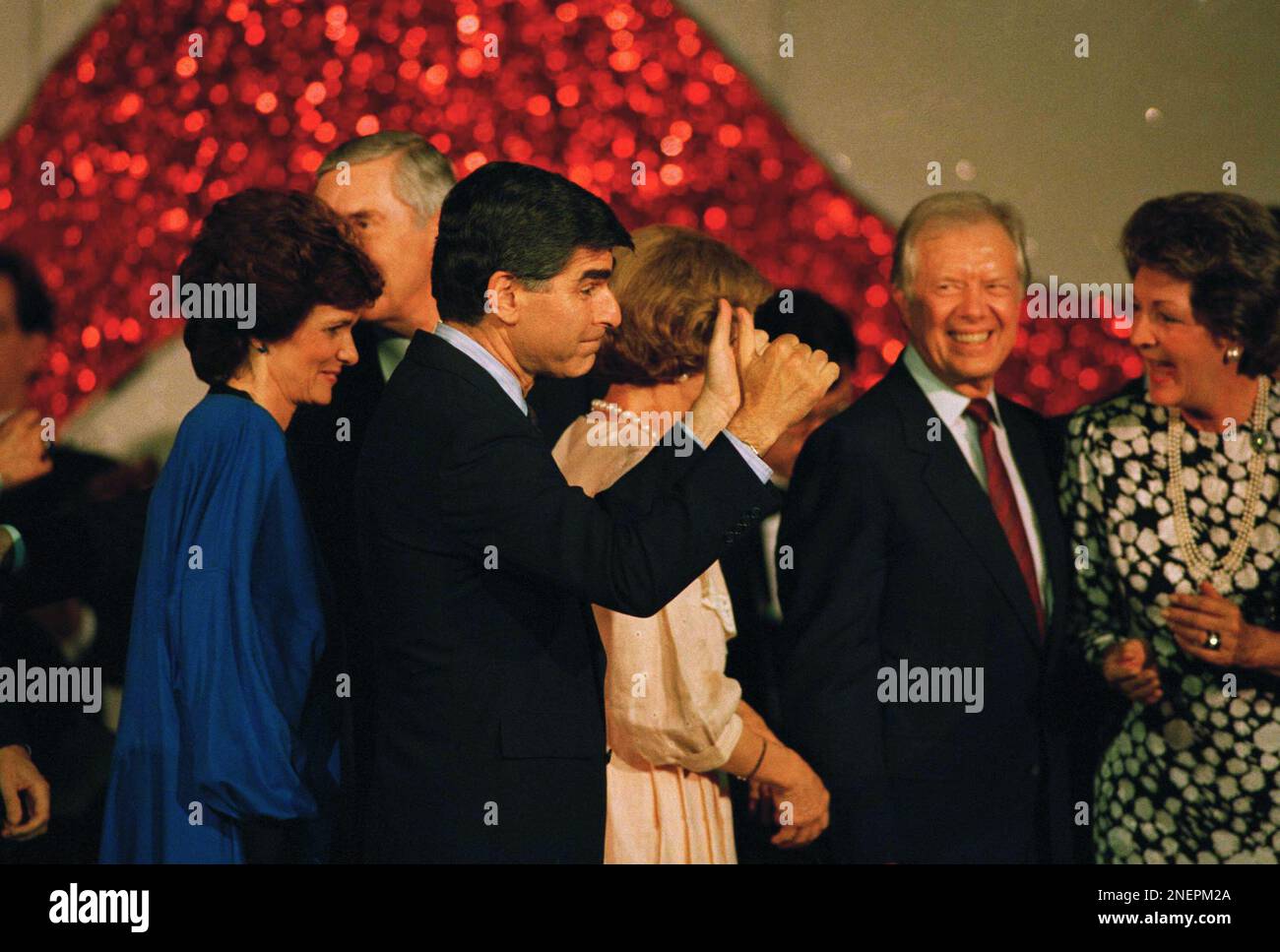 Michael Dukakis gives double thumbs up during a reception in his honor ...