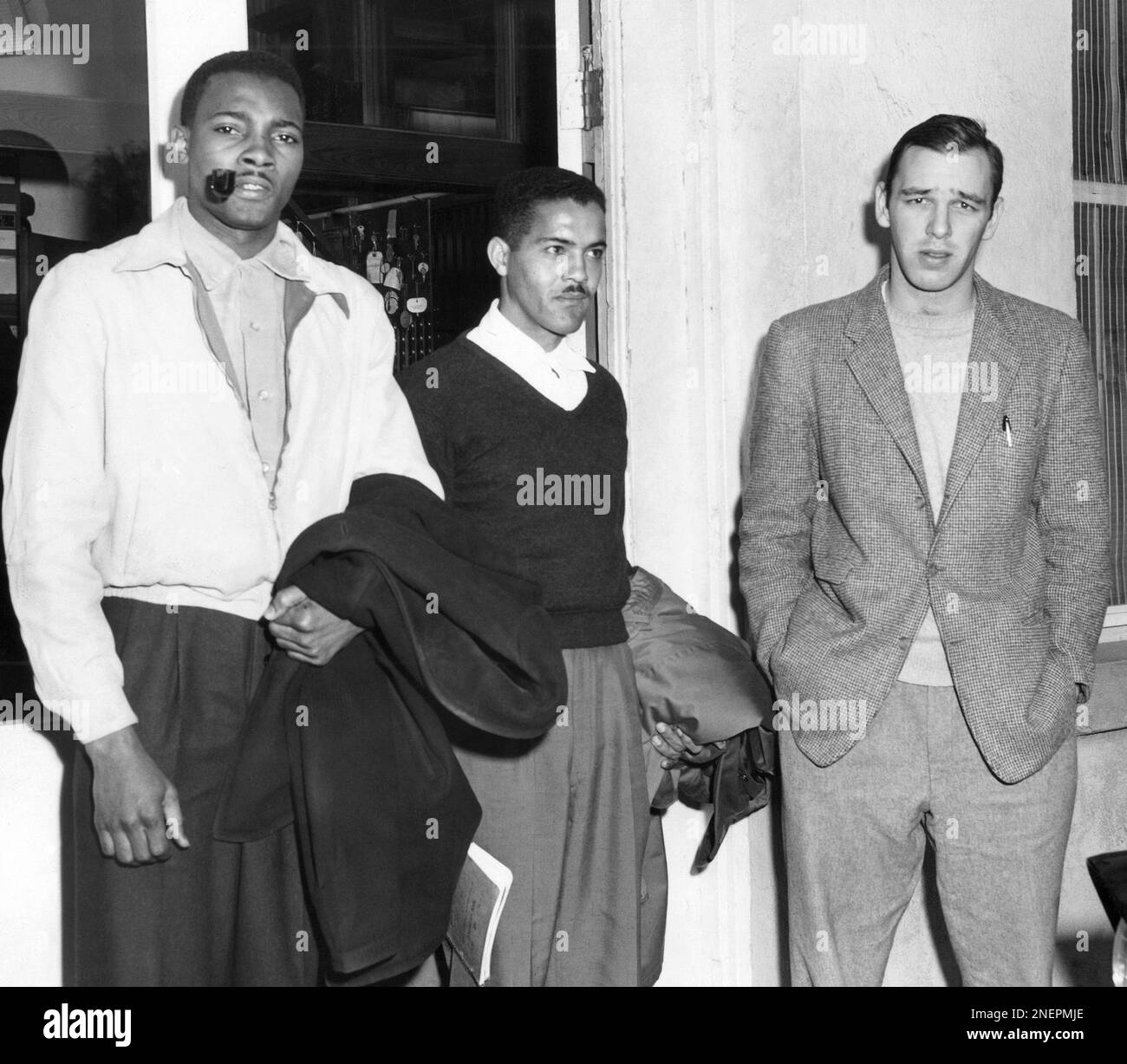 These three students were photographed at the police station following ...