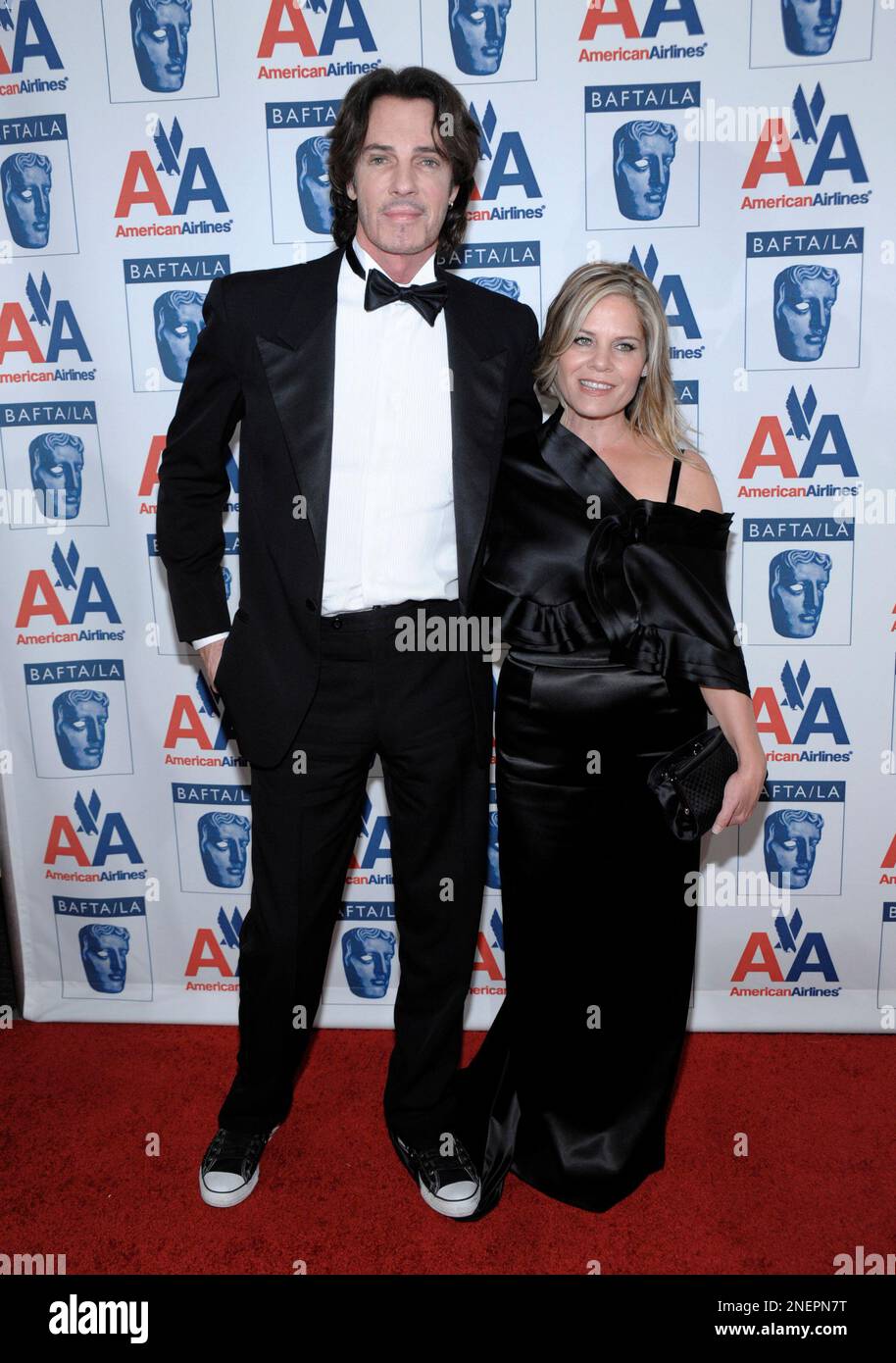 Actor and singer Rick Springfield, left, and his wife Barbara Porter ...