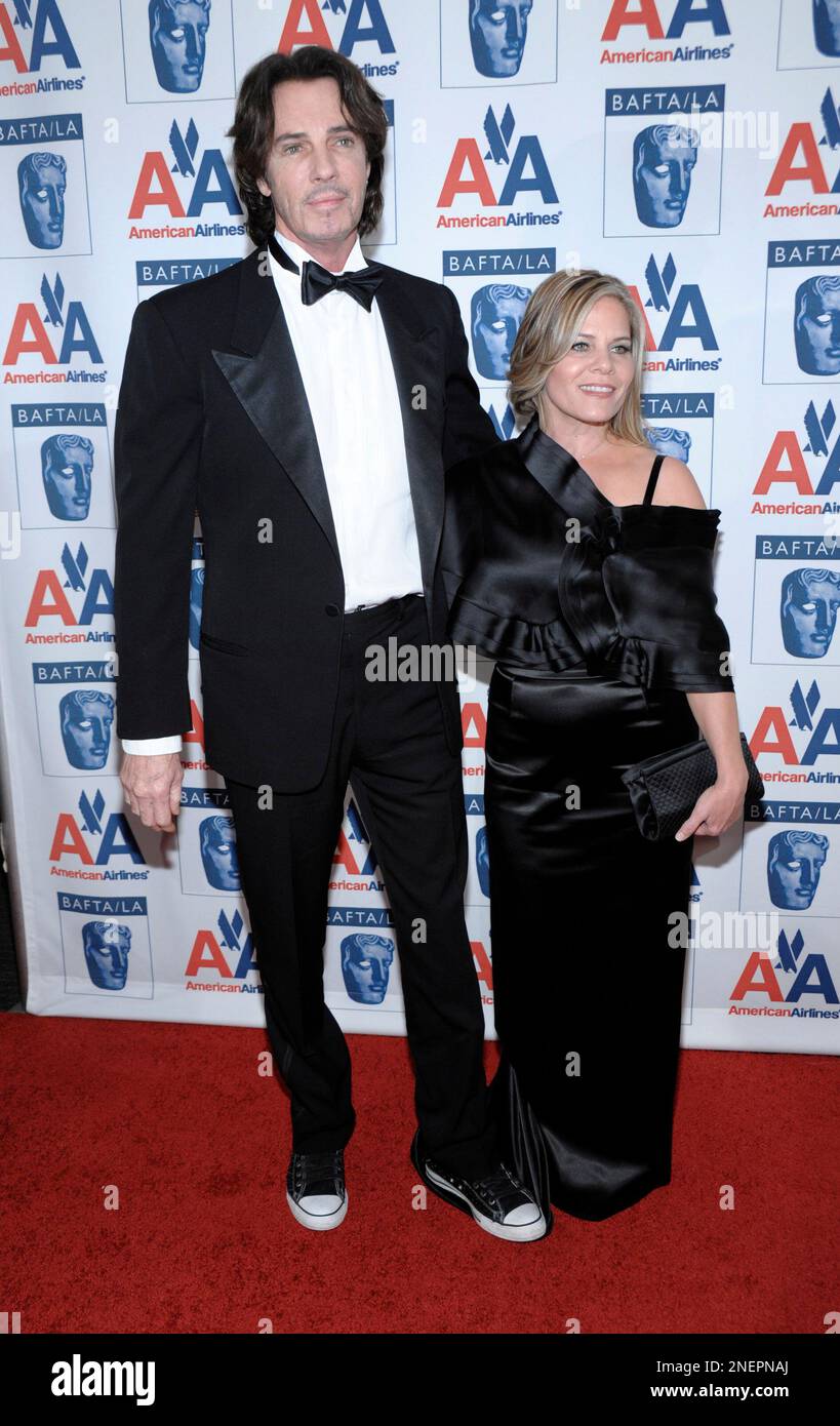 Actor and singer Rick Springfield, left, and his wife Barbara Porter ...