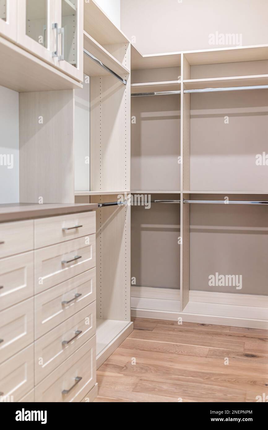Walk-in closet shelves, chest of drawers in modern minimalist white ...
