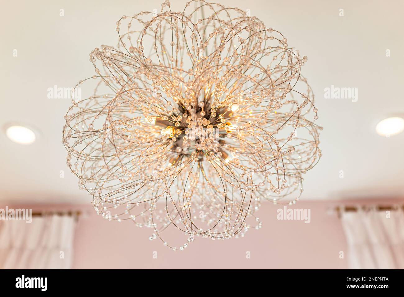Modern ceiling lamp lantern light closeup in pink home house room ...