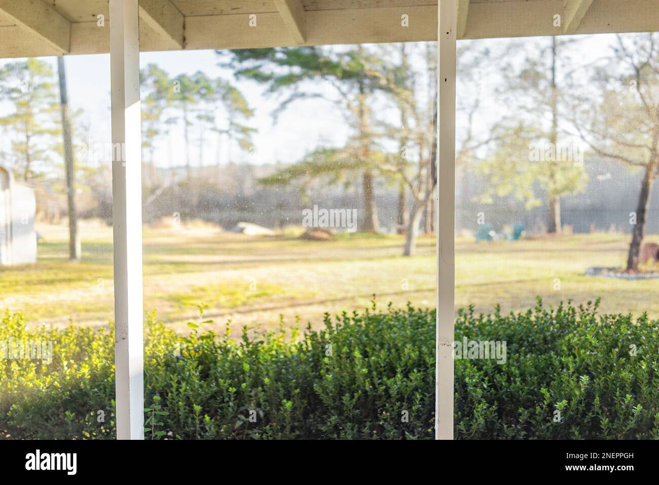 South Carolina sunset near Lake Marion with back porch and mesh screen ...