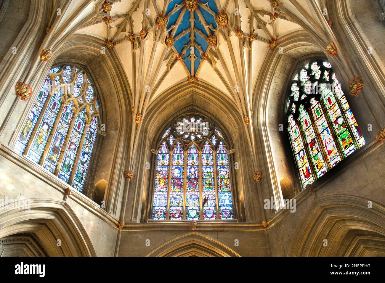 Stained-glass windows and section of ceiling in Tewkesbury Abbey (The ...