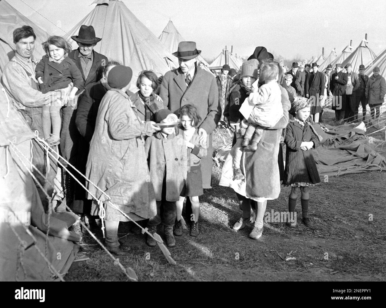 Harry Hopkins, WPA administrator, shown with refugees at a ...