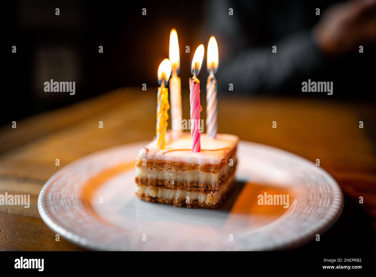 French Napolean cake slice macro closeup on white plate layered with ...