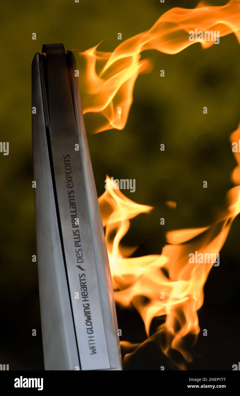 The Olympic torch burns during the Vancouver 2010 Winter Olympic Games ...