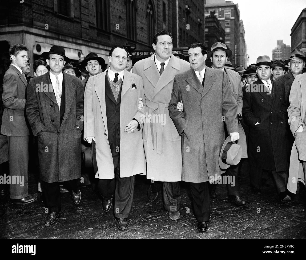 Max Baer, former World Heavyweight boxing champion, center Izzy Grove ...