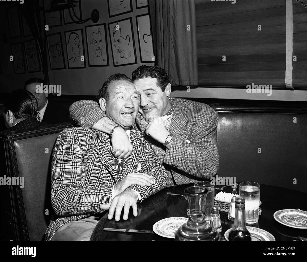 Max Baer, right, and Maxie Rosenbloom engage in a little mock scrapping ...