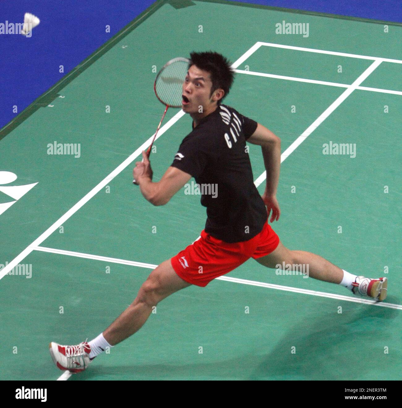 China's Dan Lin in action against China's Jin Chen during a match at ...