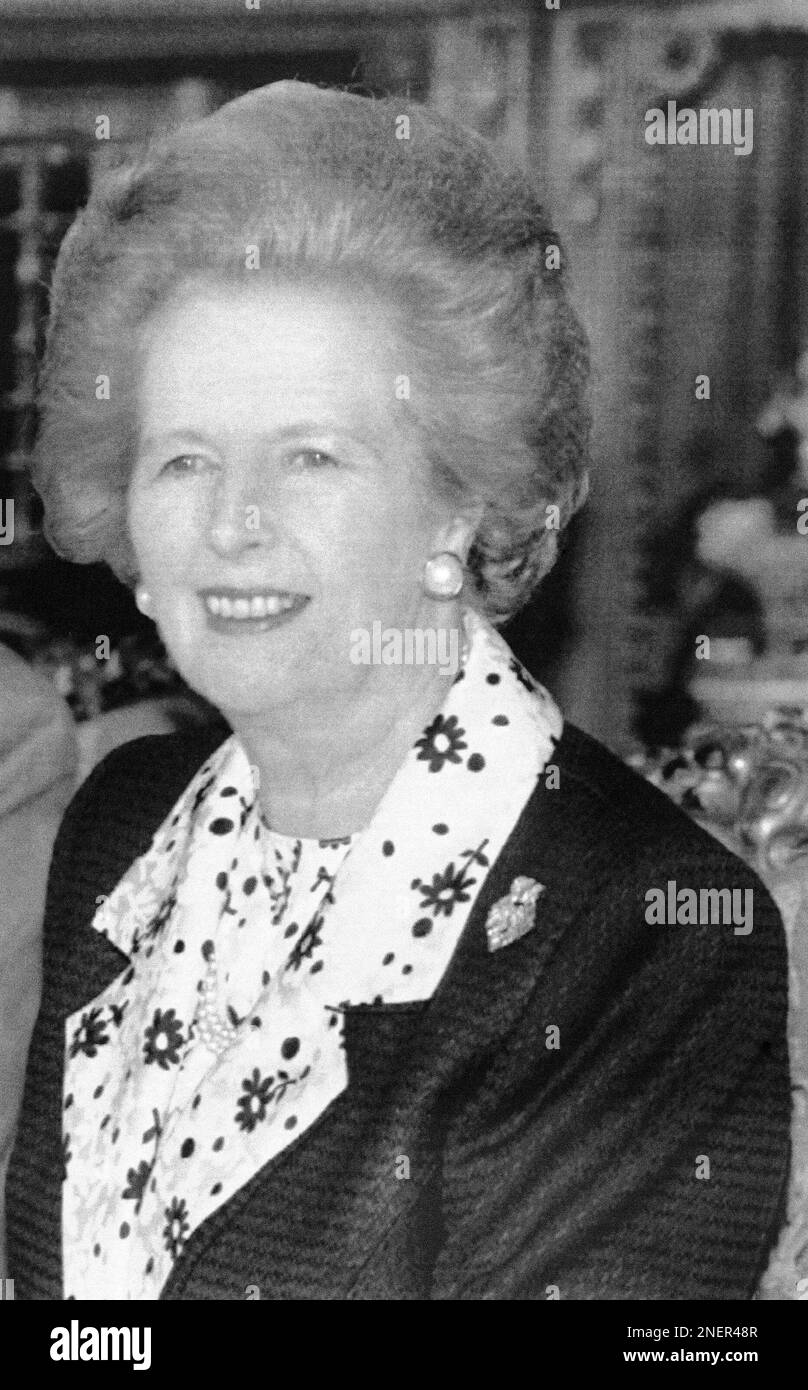 Britain?s Prime Minister Margaret Thatcher retains her smile despite ...