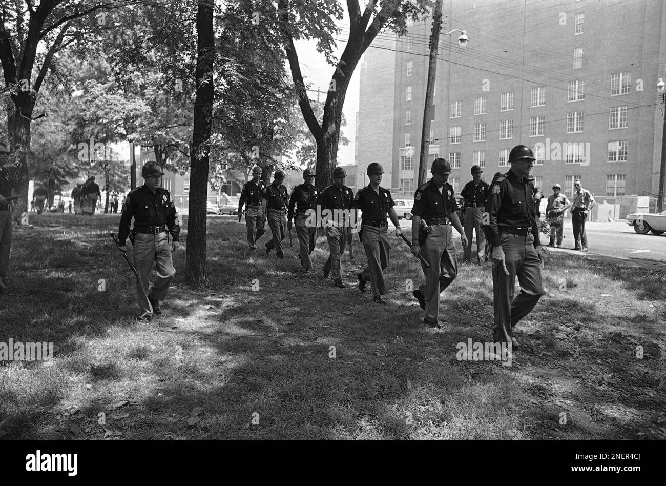A squad of Alabama Highway Patrolmen engages in close order drill in a ...