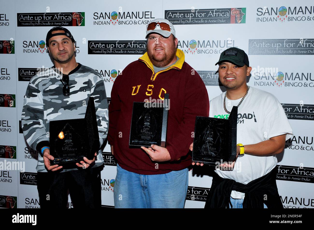 (L-R) Tournament champion Ali Akhyari, runner up Joshua Draney and ...