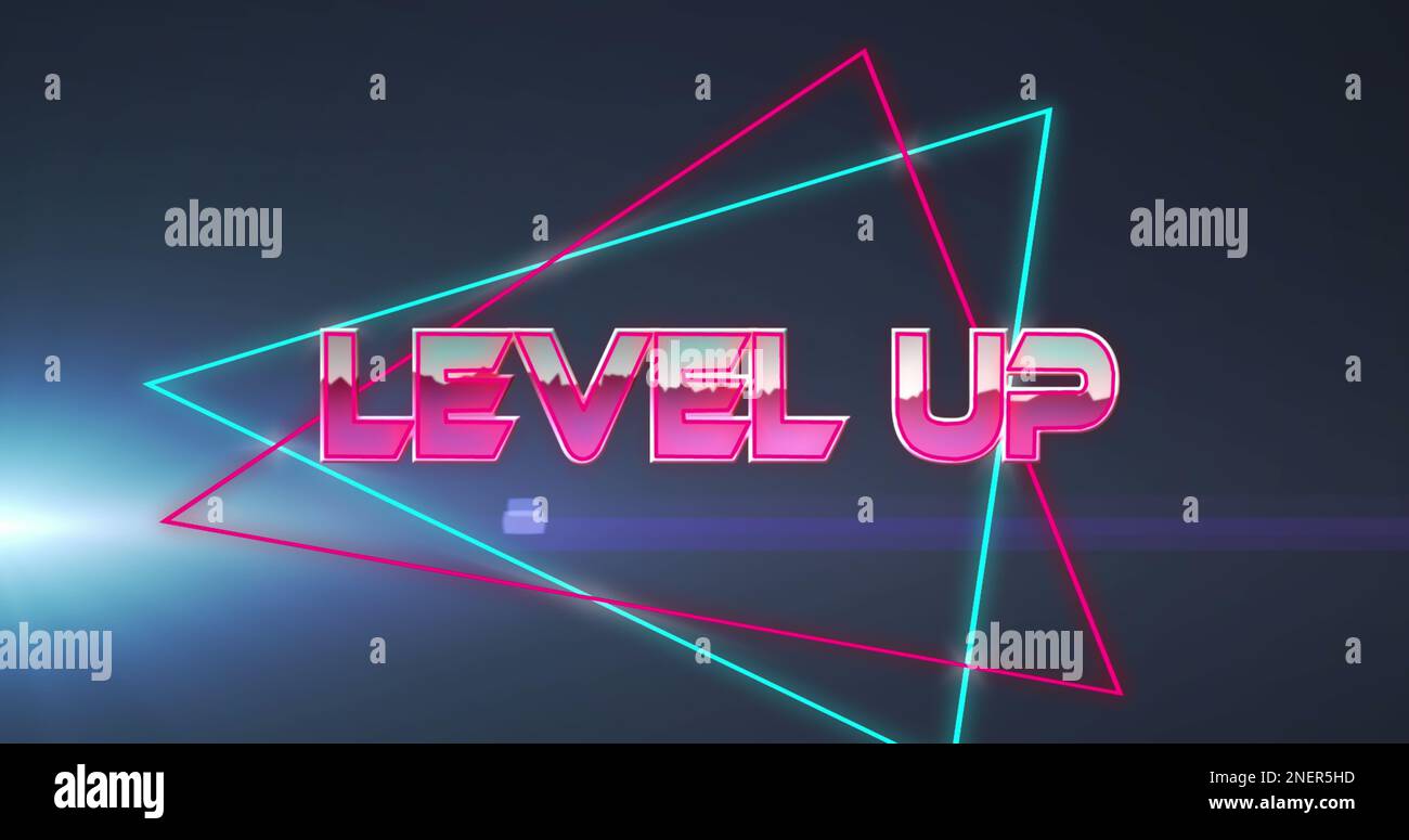 Image of level up text and graphics on dark background Stock Photo - Alamy