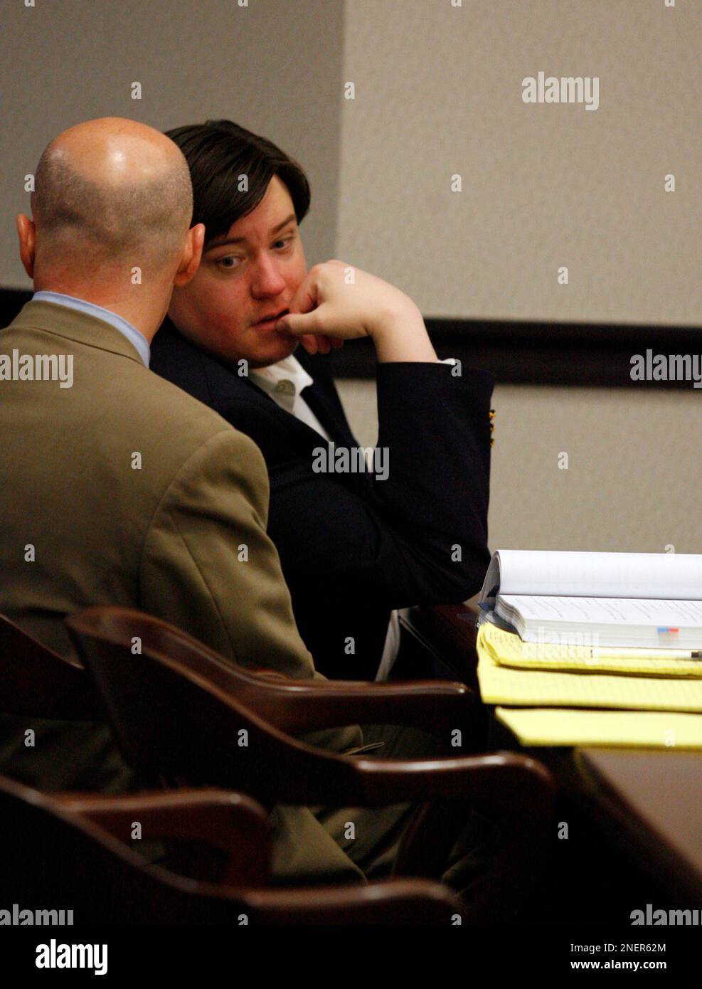 Royce Clyde Zeigler II, left, speaks to Neal Davis III, one of his ...