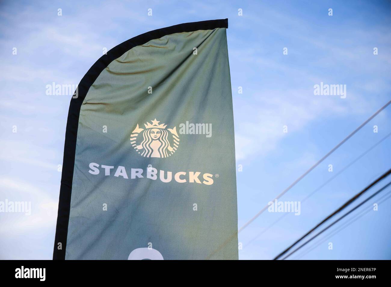 advertising banner at sunset of the StarBooks or Starbooks cafe ...