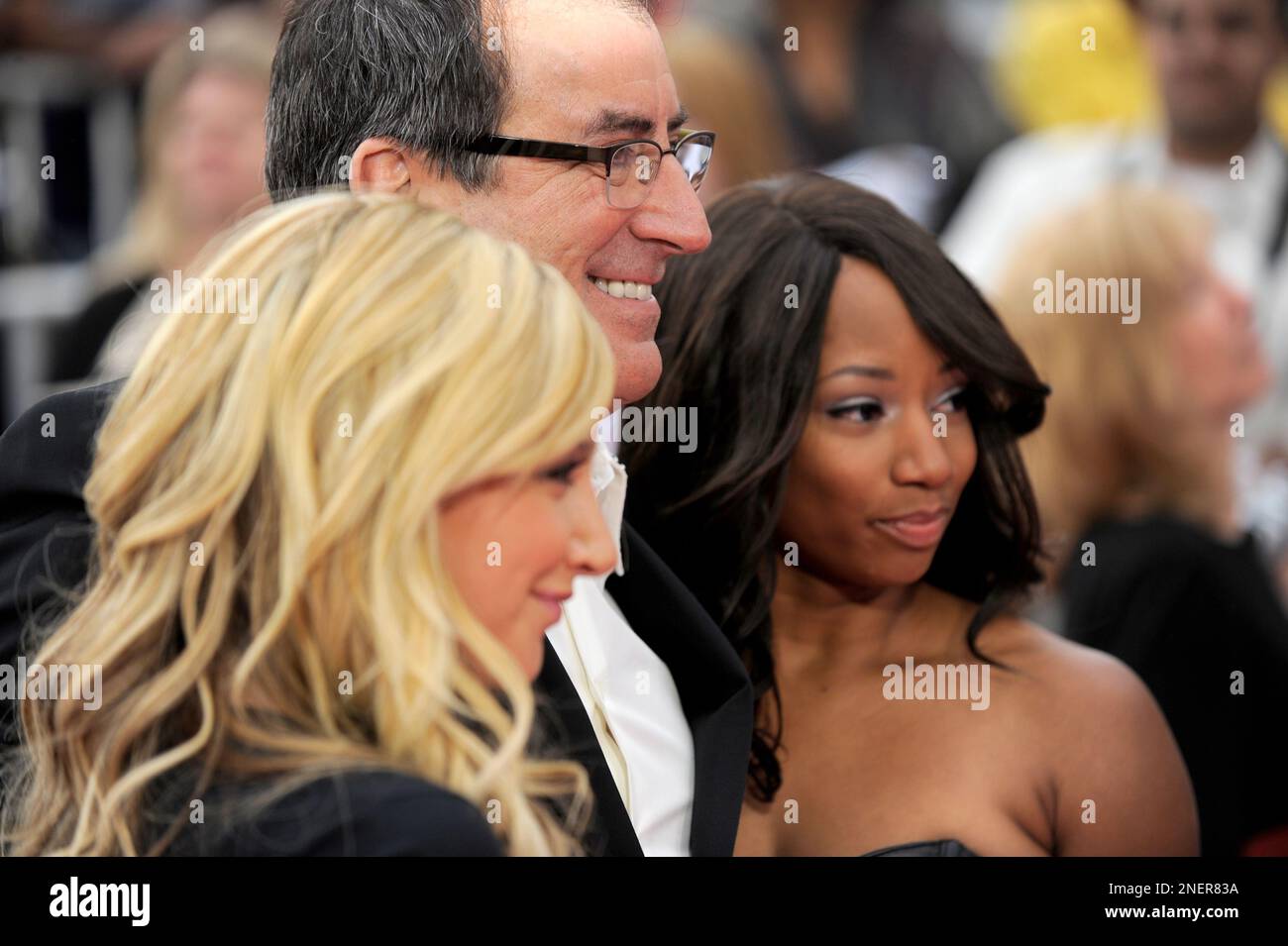 Ashley Tisdale, left, director Kenny Ortega, and Monique Coleman arrive ...