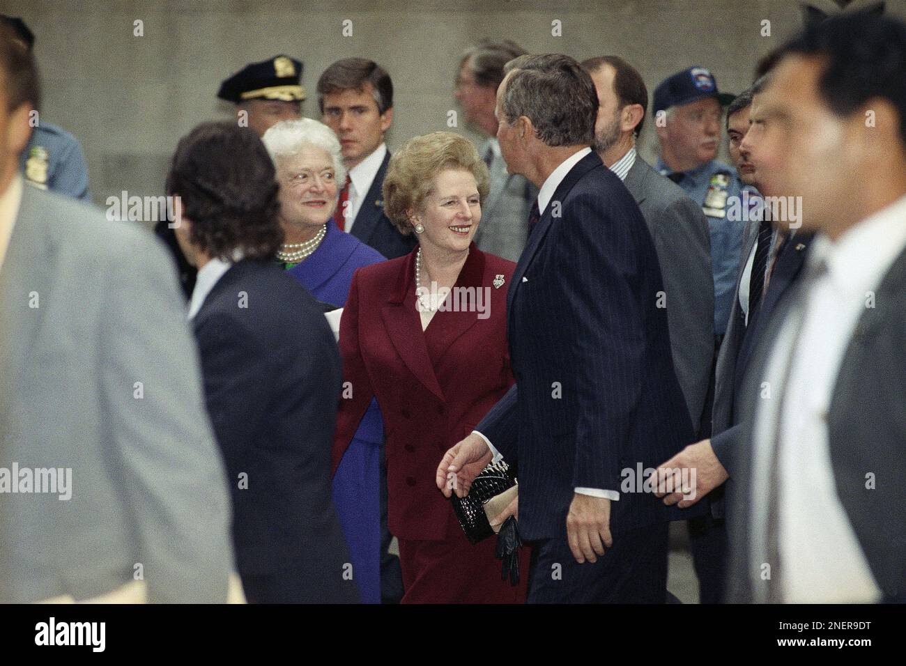 British Prime Minister Margaret Thatcher, center, leaves St. Bartholmew ...