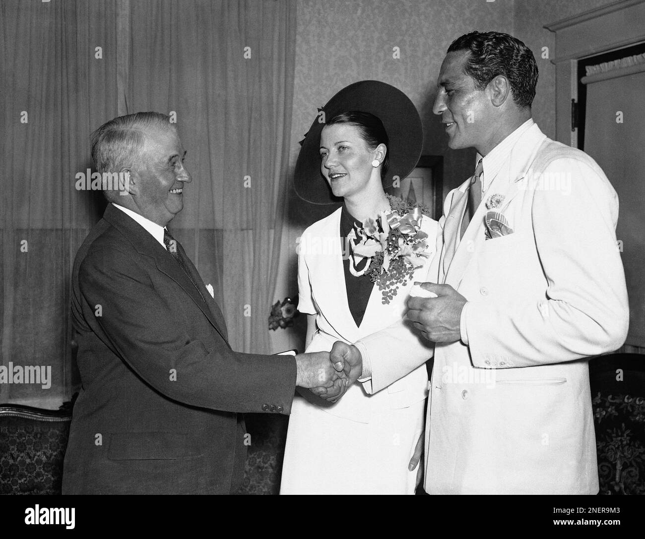 Here is the prizefighter and his lady with Justice Dickinson Letts, at ...