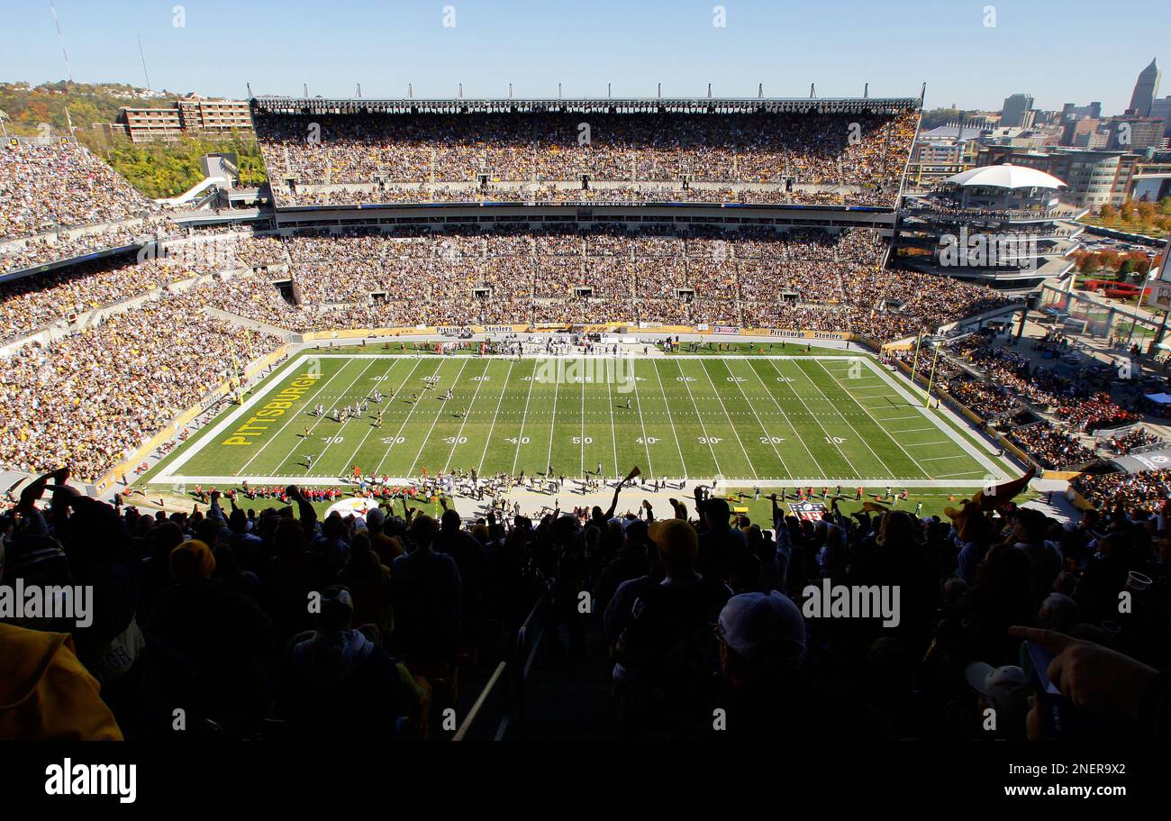 A record crowd of 65,597 watch the Pittsburgh Steelers play the ...