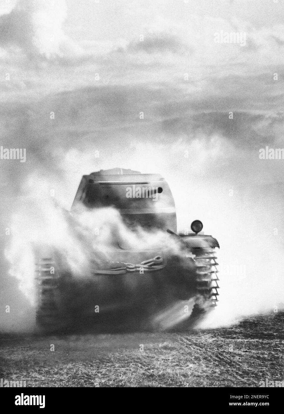 From behind an impenetrable smoke screen this heavy German tanks milled ...