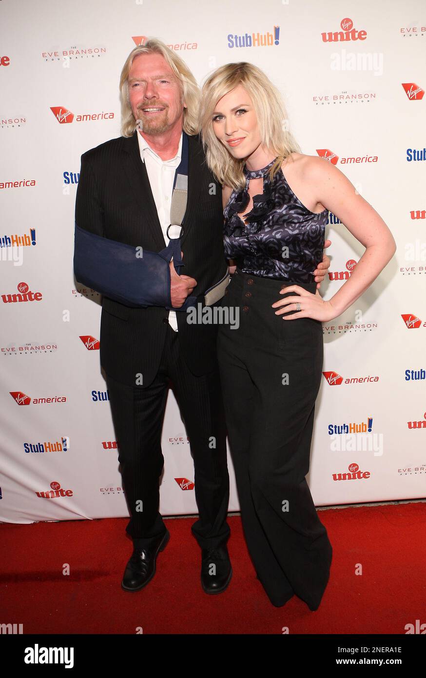 Sir Richard Branson and musician Natasha Bedingfield attend the Rock ...
