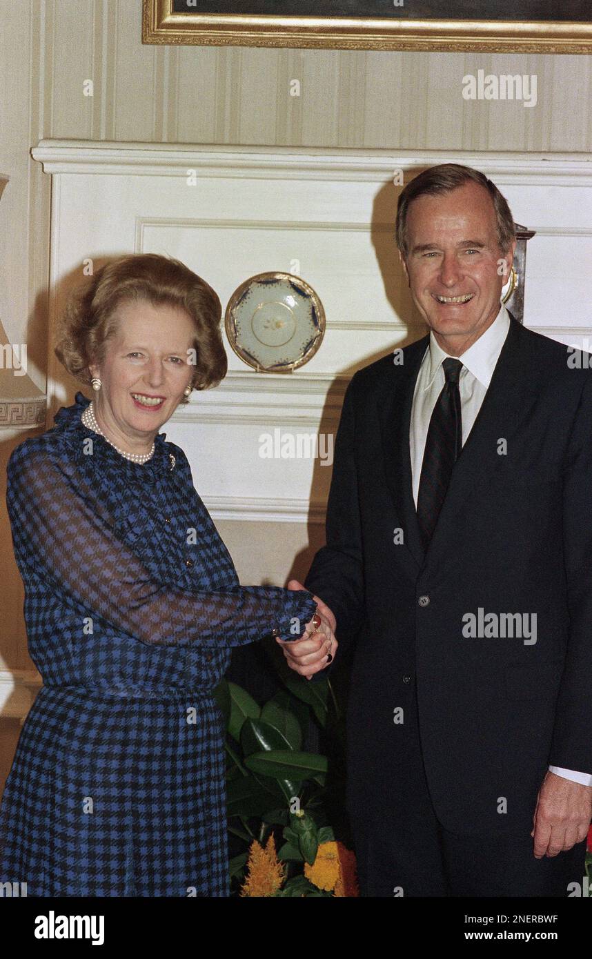 British Prime Minister Margaret Thatcher poses for photographers with ...