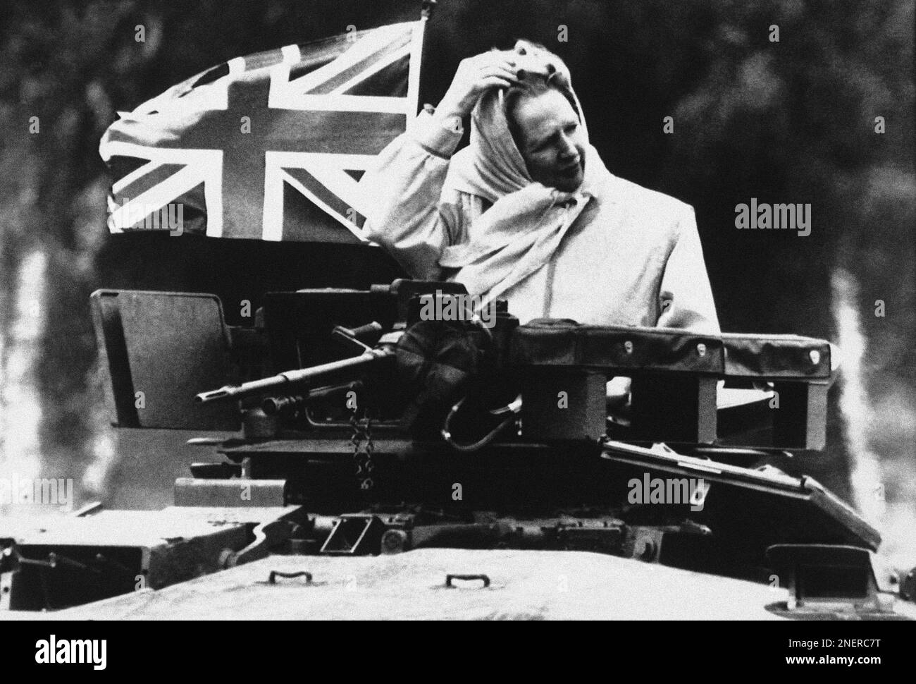 British Prime Minister Margaret Thatcher is pulling off her safety ...