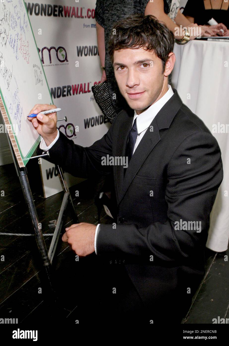 Actor Michael Rady signs the wonderwall.com poster at the 20th ...