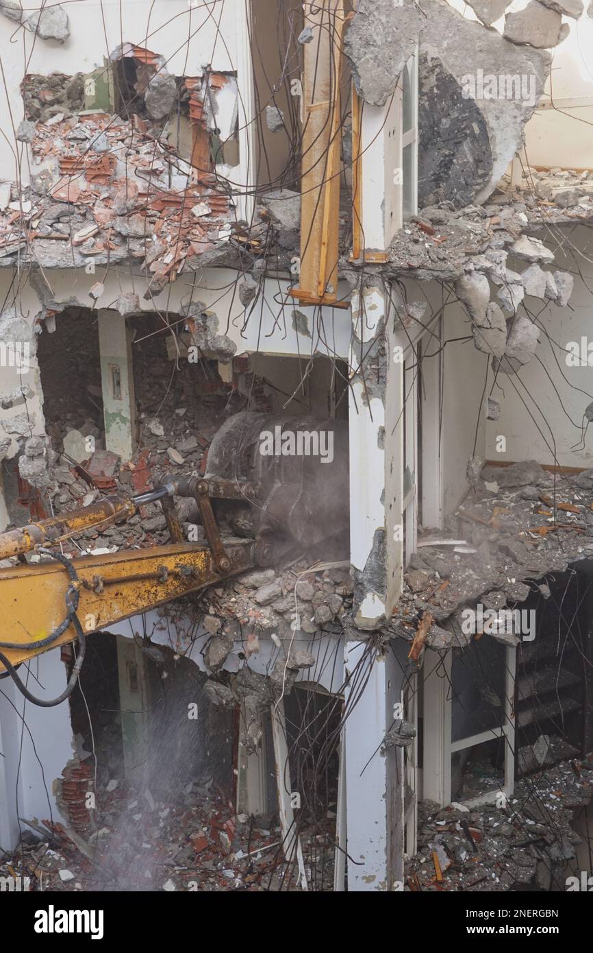 Excavator in demolition building debris hi-res stock photography and ...