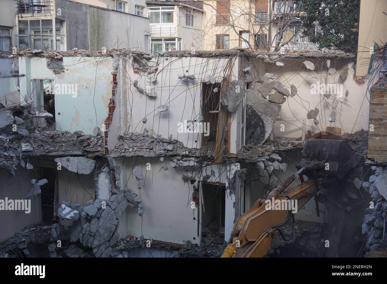 excavator work in demolished building, demolition, debris Stock Photo ...