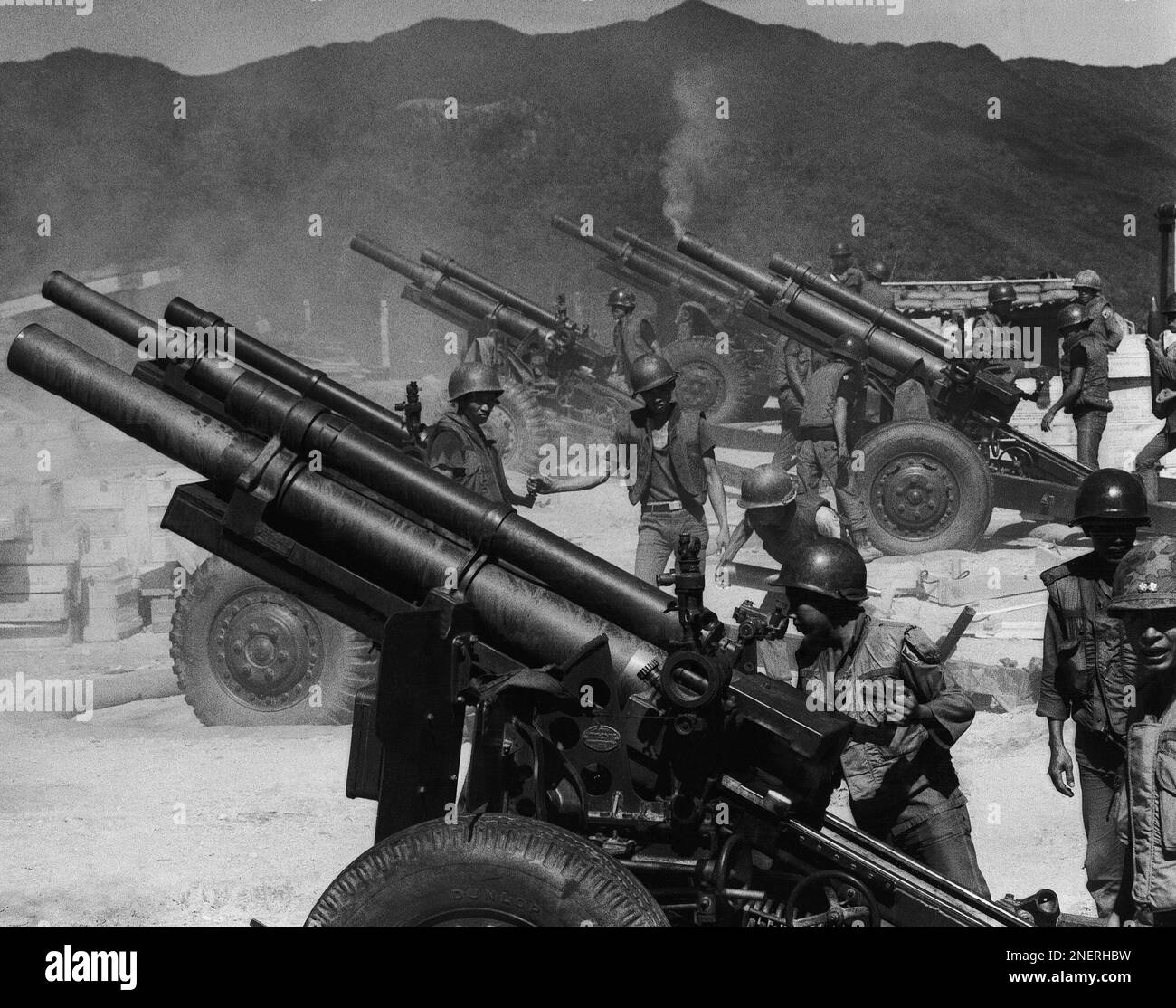 Five 105mm Howitzers stationed on August 18, 1970 atop a flattened ...
