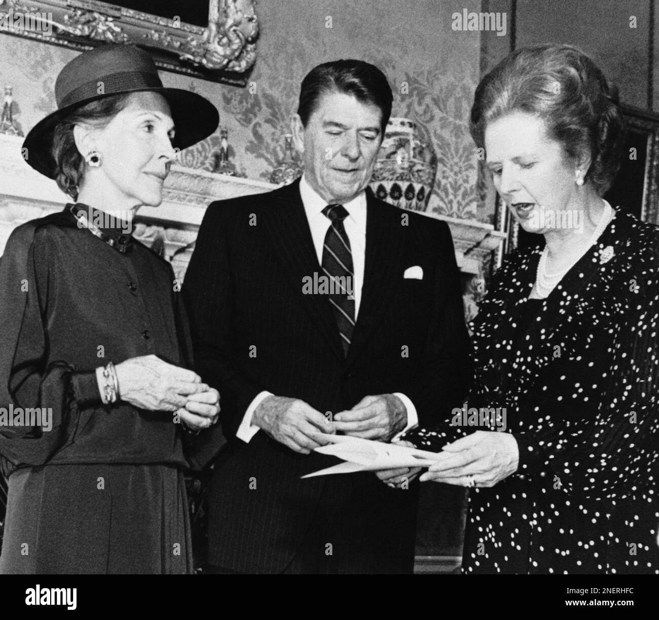 President Ronald Reagan and Mrs. Nancy Reagan look on, as Britain?s ...